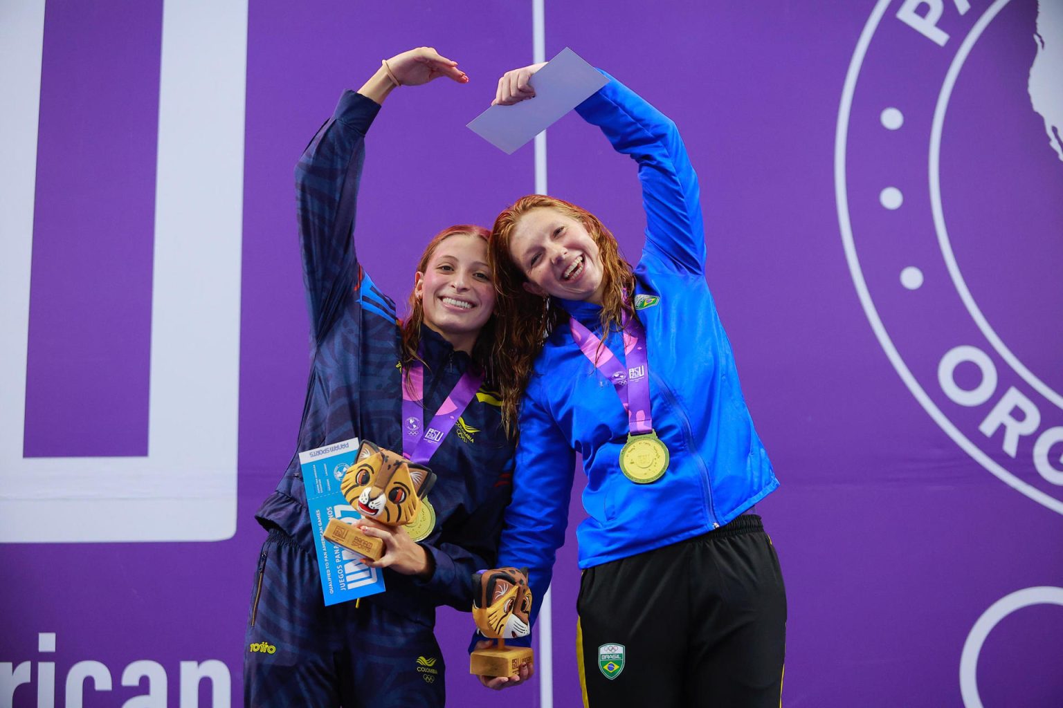 Brasileña y colombiana sorprenden con doble oro y récord en natación de ...